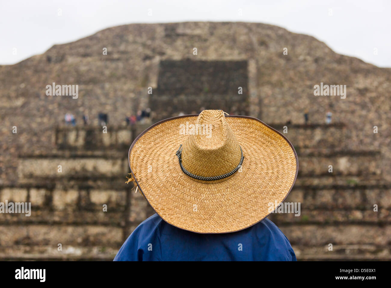 Mexican man wearing straw hat with Pyramid of the Sun, Teotihuacan ...