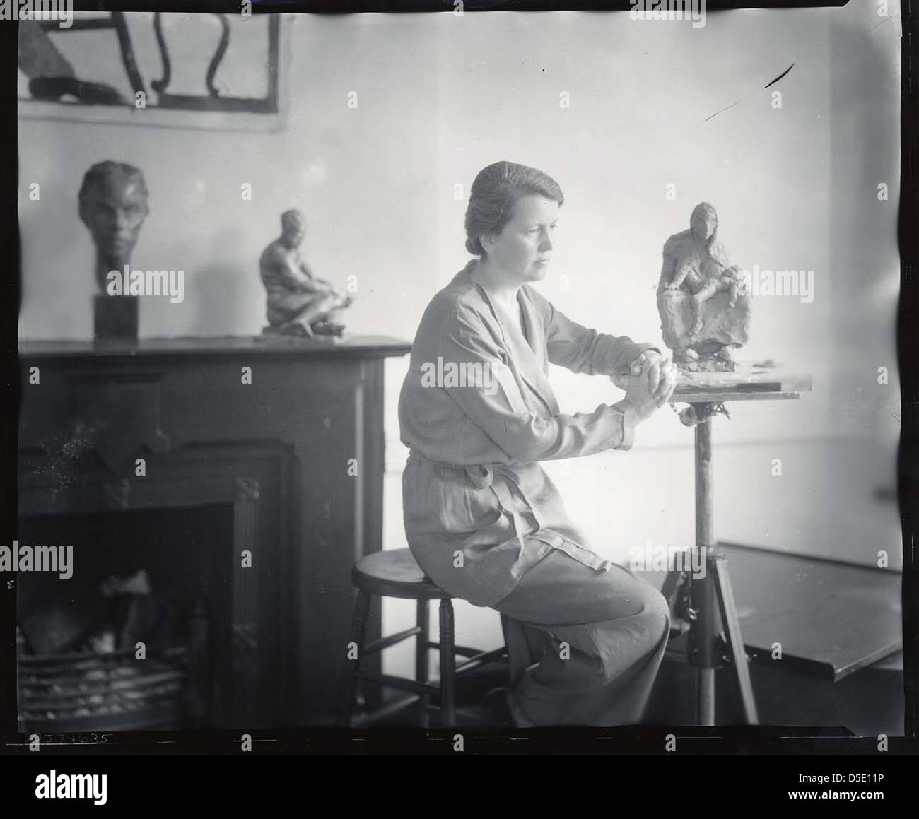 A photograph of Doris Caesar, an American sculptor, in her studio. The ...