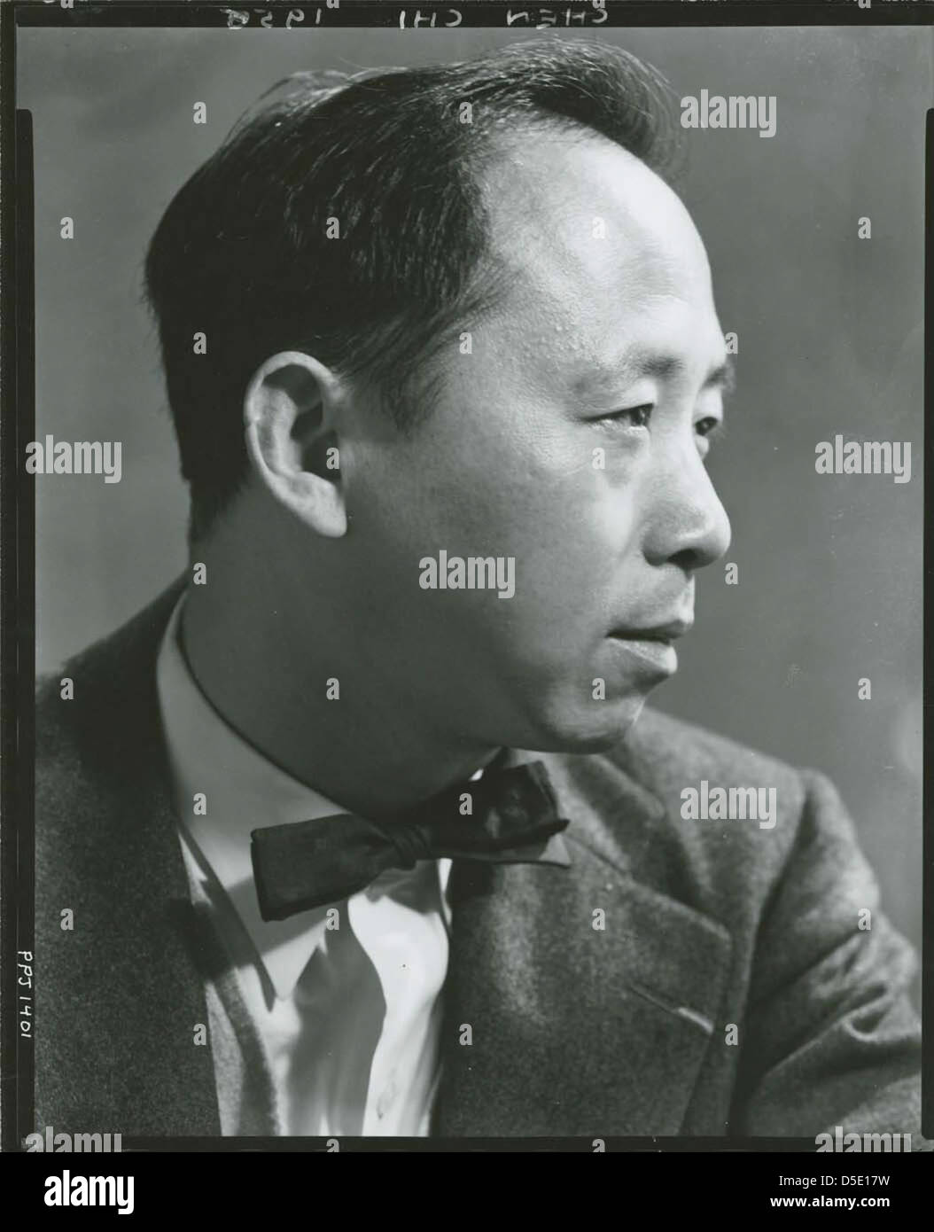 A black-and-white portrait of an Asian male, taken by photographer ...