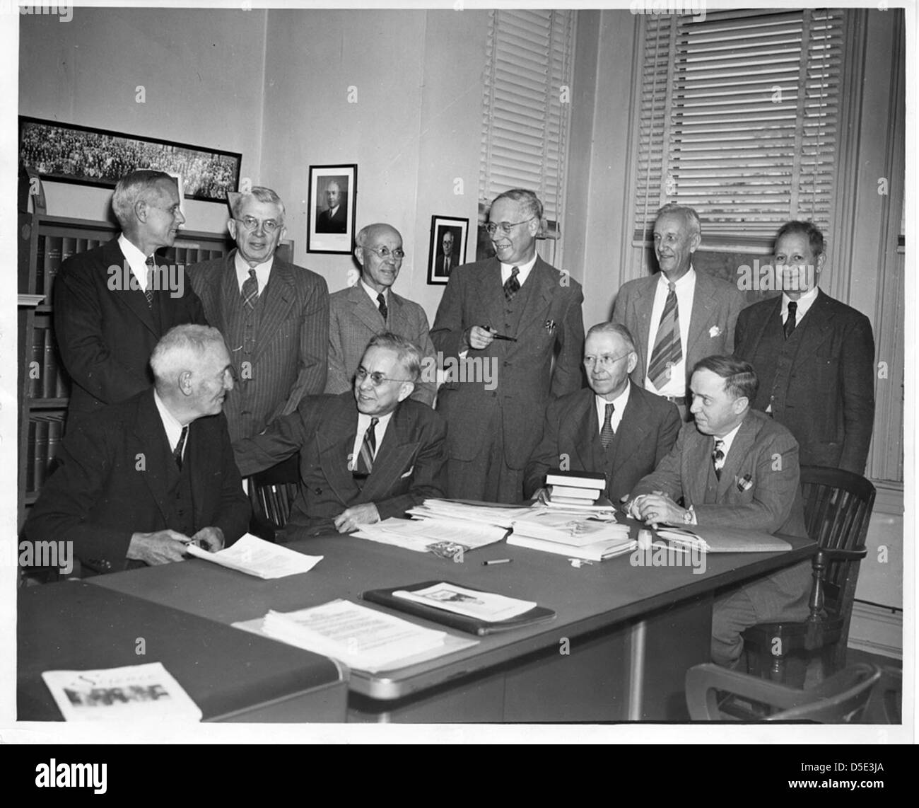 This historical photograph shows prominent figures in early 20th ...