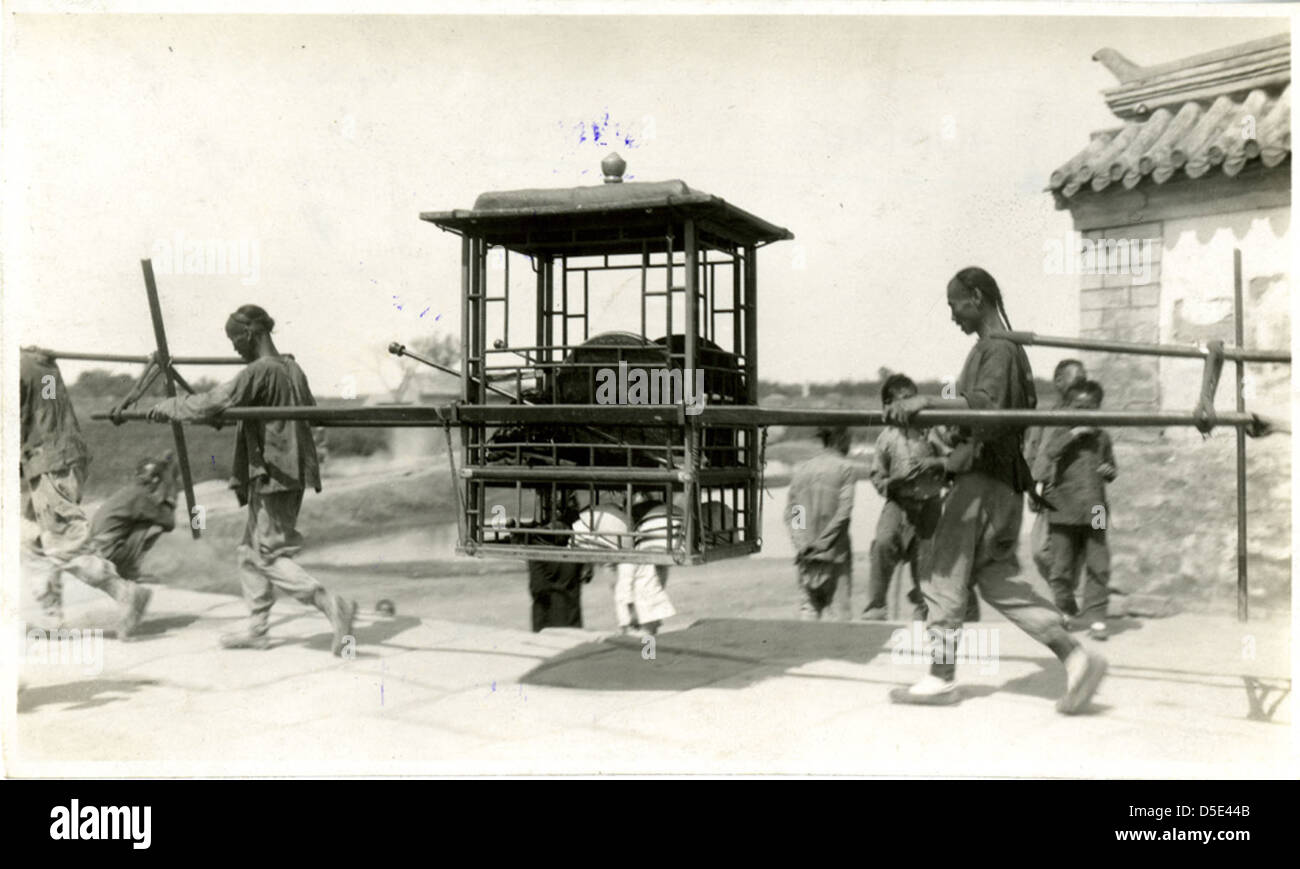 China, Miscellaneous Scenes: Chinese men carrying a litter Stock Photo ...