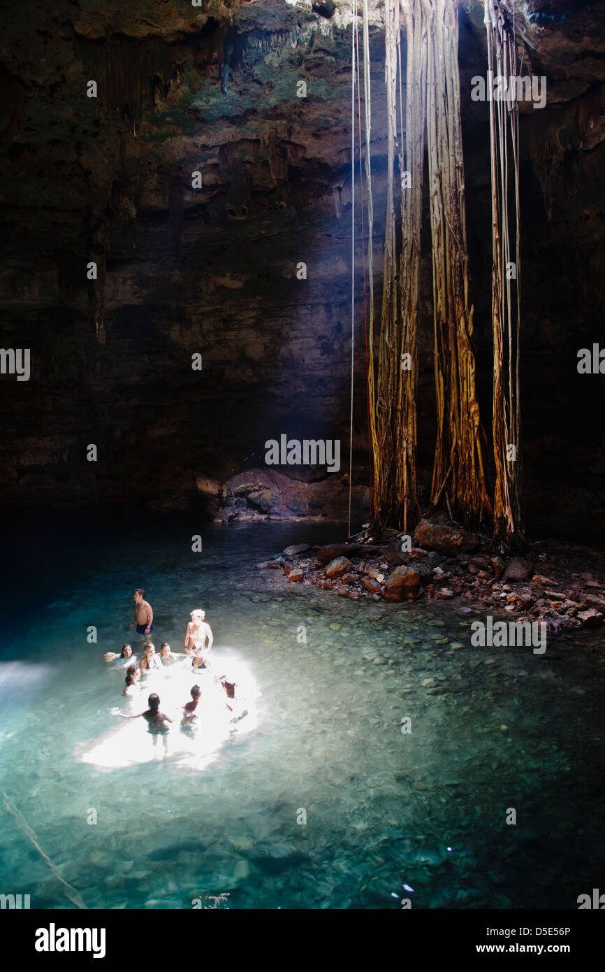 Tourists in Cenote Samula, on the Yucatan Peninsula near the city of ...