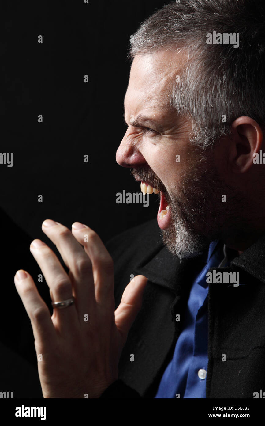 Low key portrait sinister man hi-res stock photography and images - Alamy