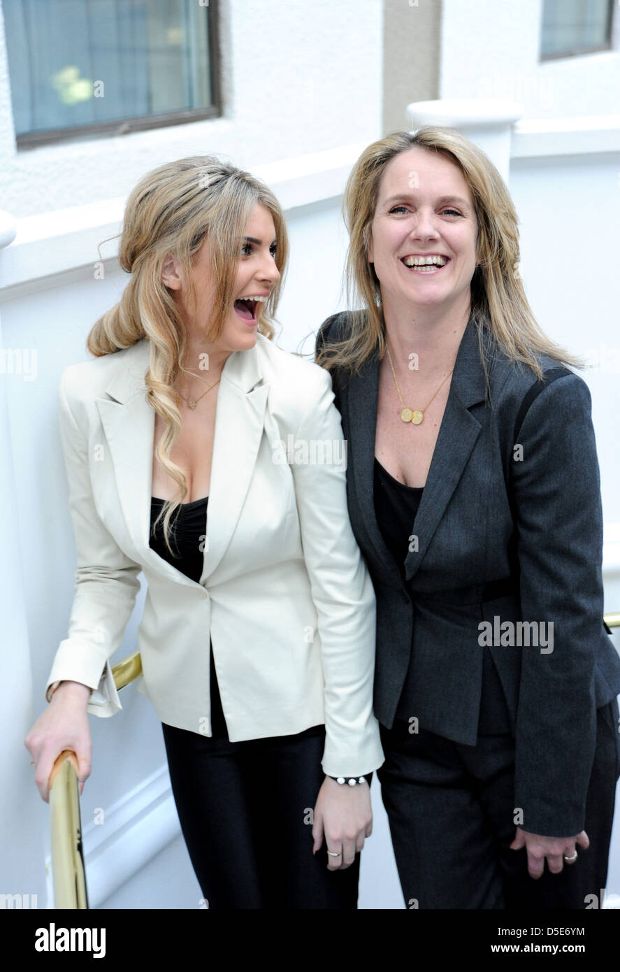 Mother 40s and daughter 20s having fun together posing for camera Stock ...