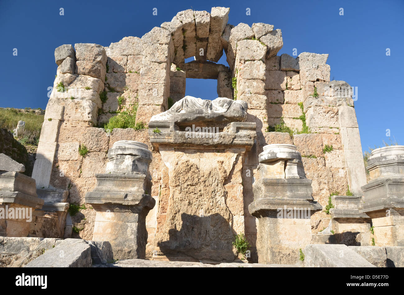 The nymphaeum at ancient Perge, Turkey, with the statue of Kestros the ...