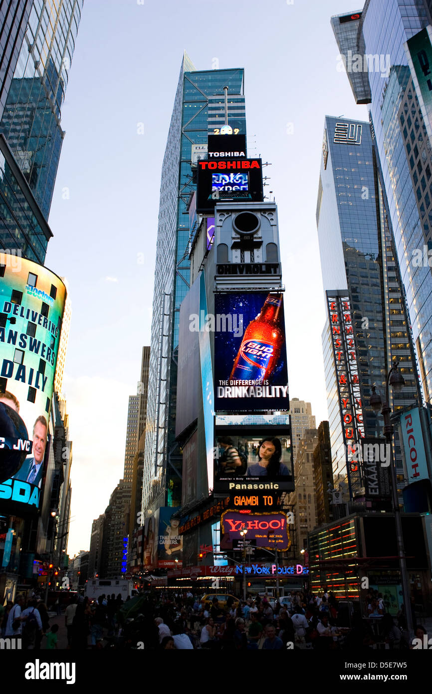 The tall buildings and adverts in Times Square in New York City with ...