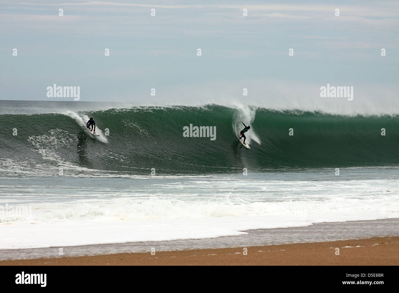 Surfers in south-west France Stock Photo - Alamy