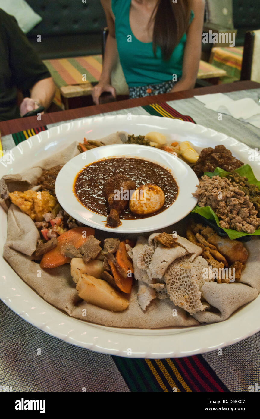 traditional Ethiopian cuisine, doro wat, injera, and curry Stock Photo ...