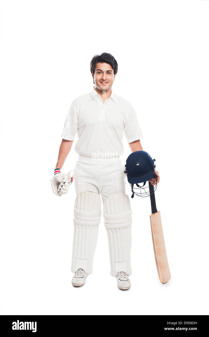 Professional sportsperson standing looking at camera holding smiling hi ...