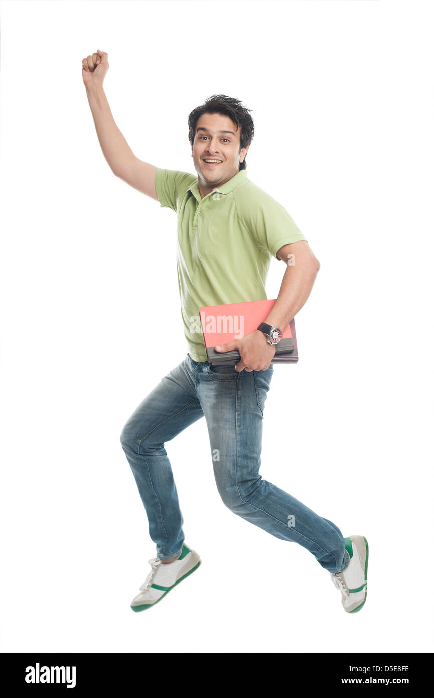 Indian college student running books hi-res stock photography and ...