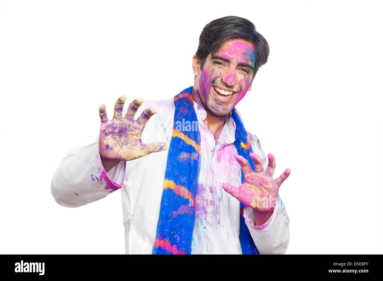 Portrait of a man celebrating Holi Stock Photo - Alamy