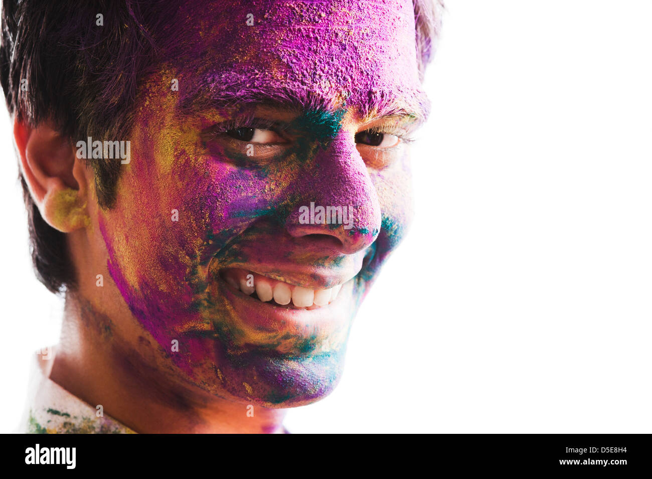 Mans face covered with powder paint during Holi festival Stock Photo ...
