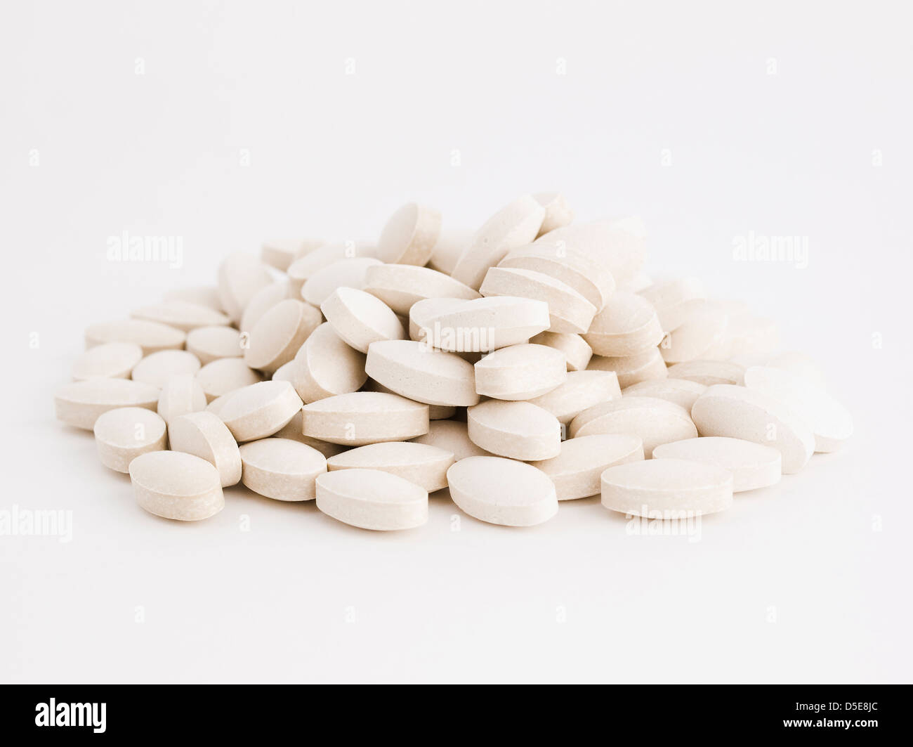 Many pills isolated on white background Stock Photo - Alamy