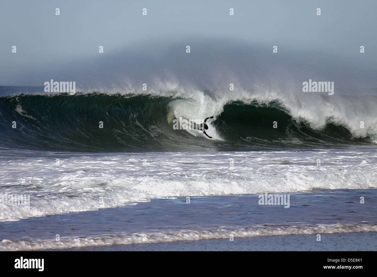 Surfer falling off board in south-west France Stock Photo - Alamy