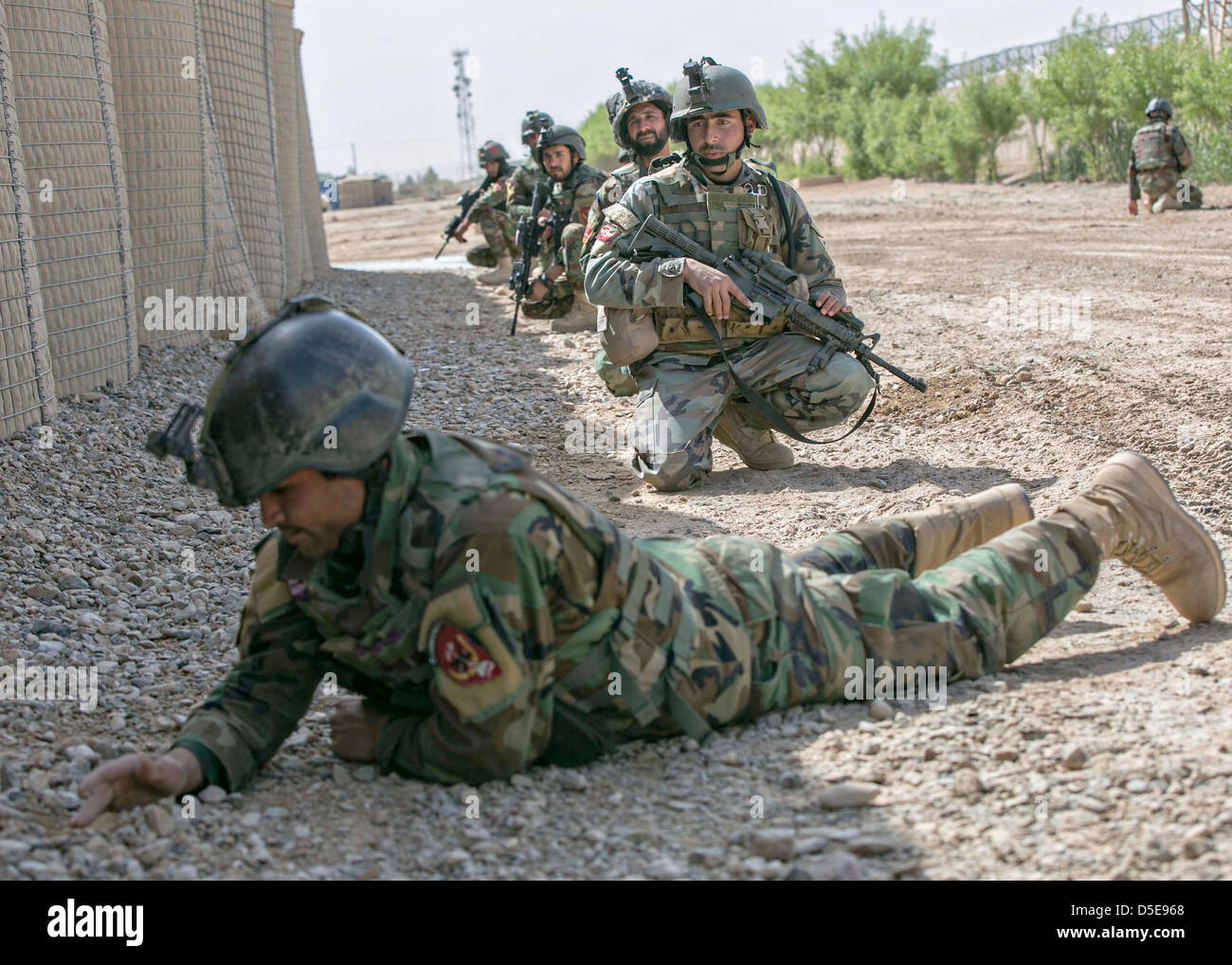 Afghan commandos from Special Operations Kandak searches for an ...