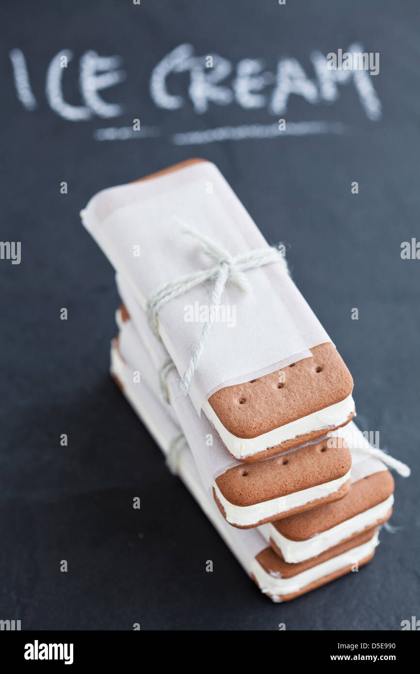 Stack of ice cream biscuits on dark background Stock Photo - Alamy