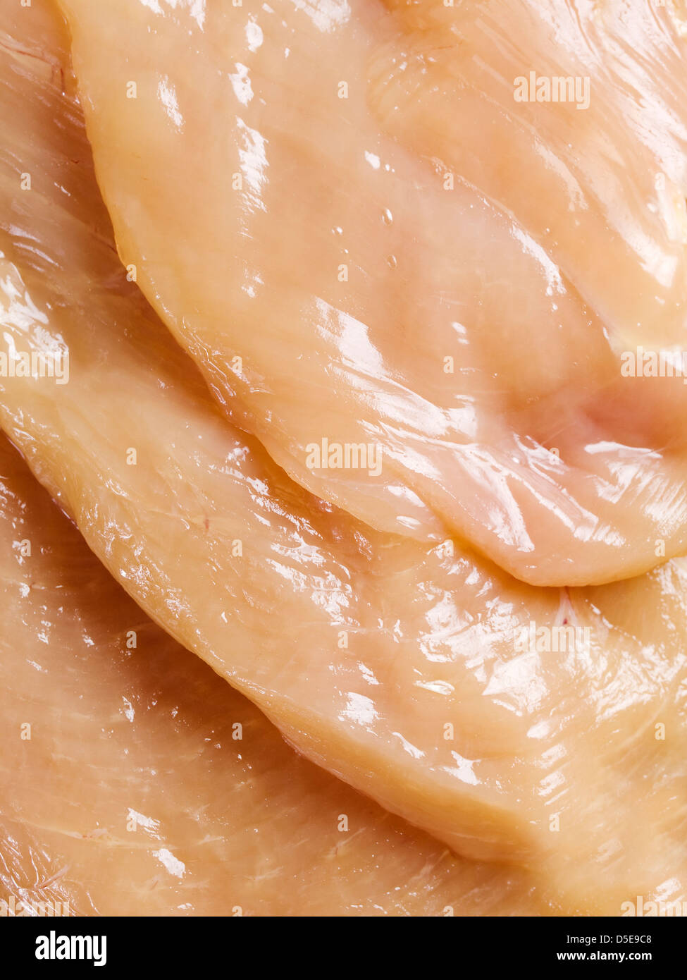 Fresh chicken background in vertical composition Stock Photo - Alamy