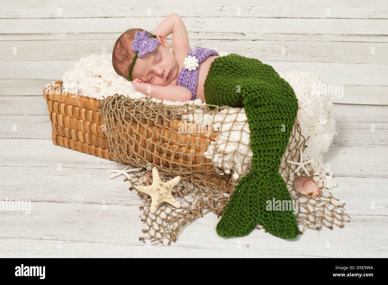 Newborn Baby Girl Wearing a Mermaid Costume Stock Photo - Alamy