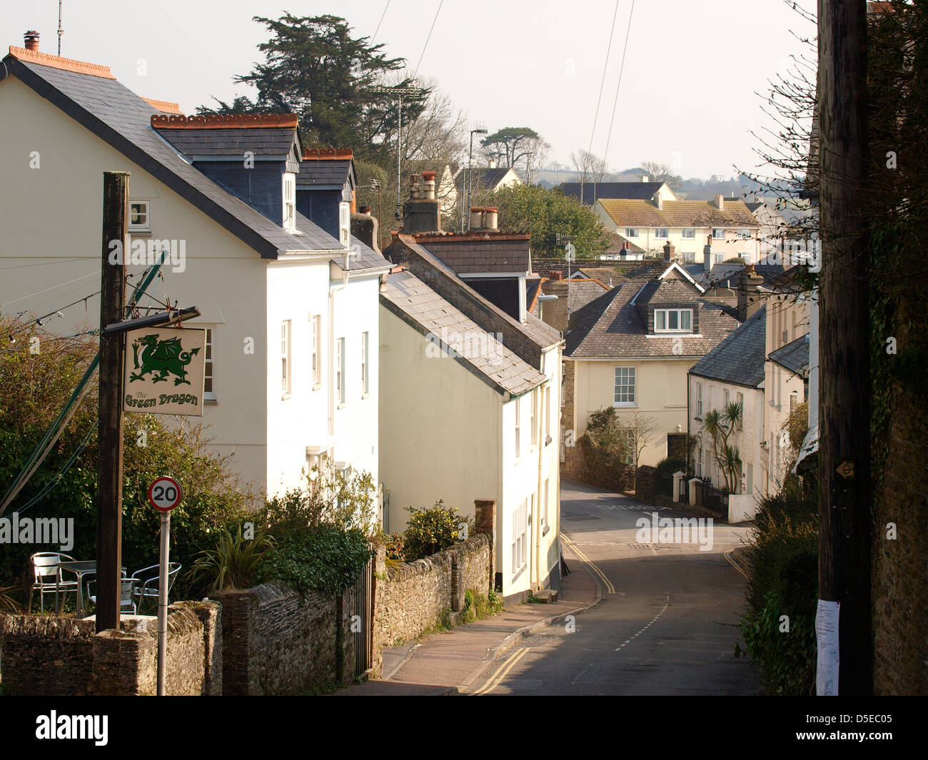 Narrow street through Devon village Stock Photo - Alamy