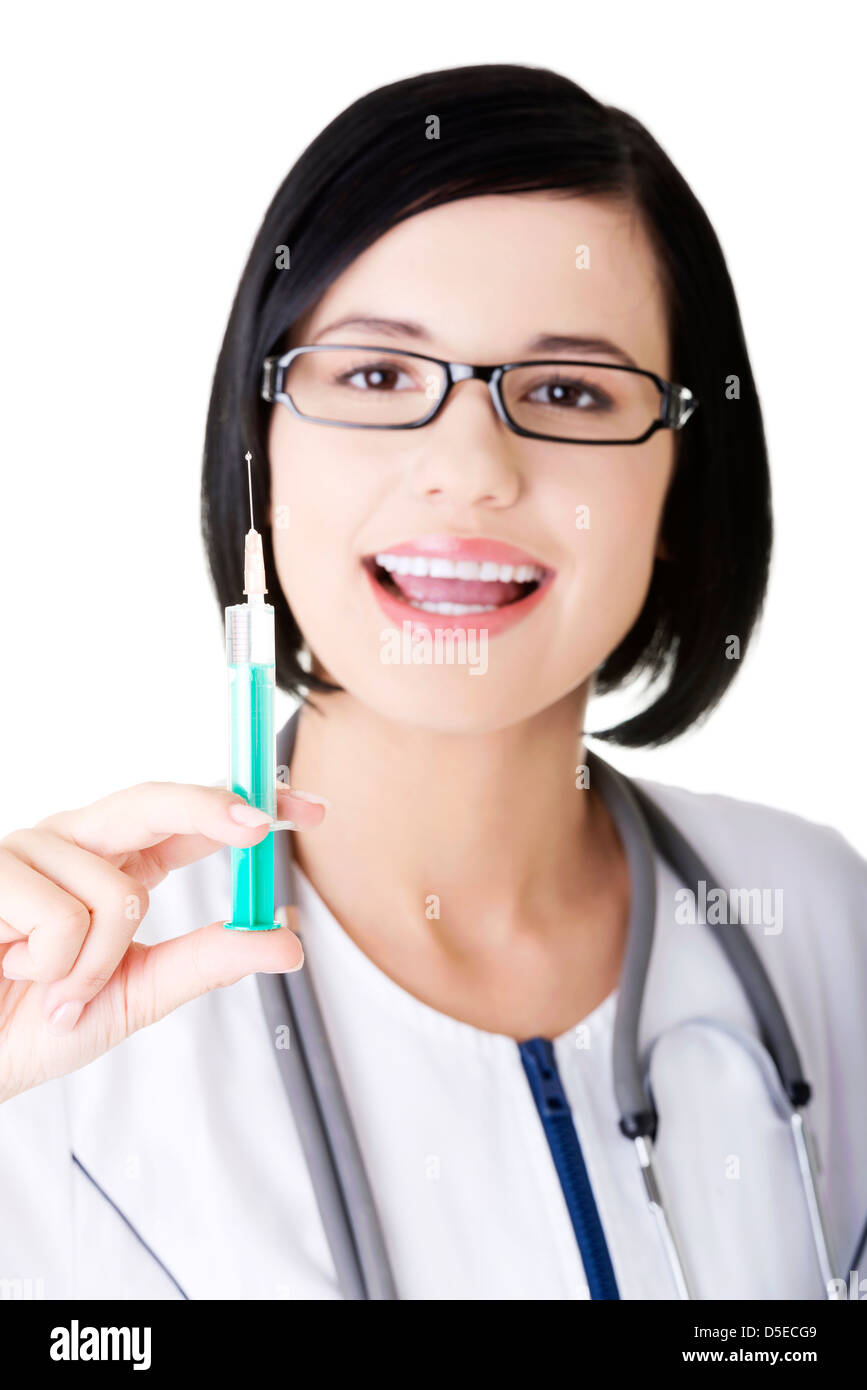 Young happy female doctor or nurse holding syringe Stock Photo - Alamy