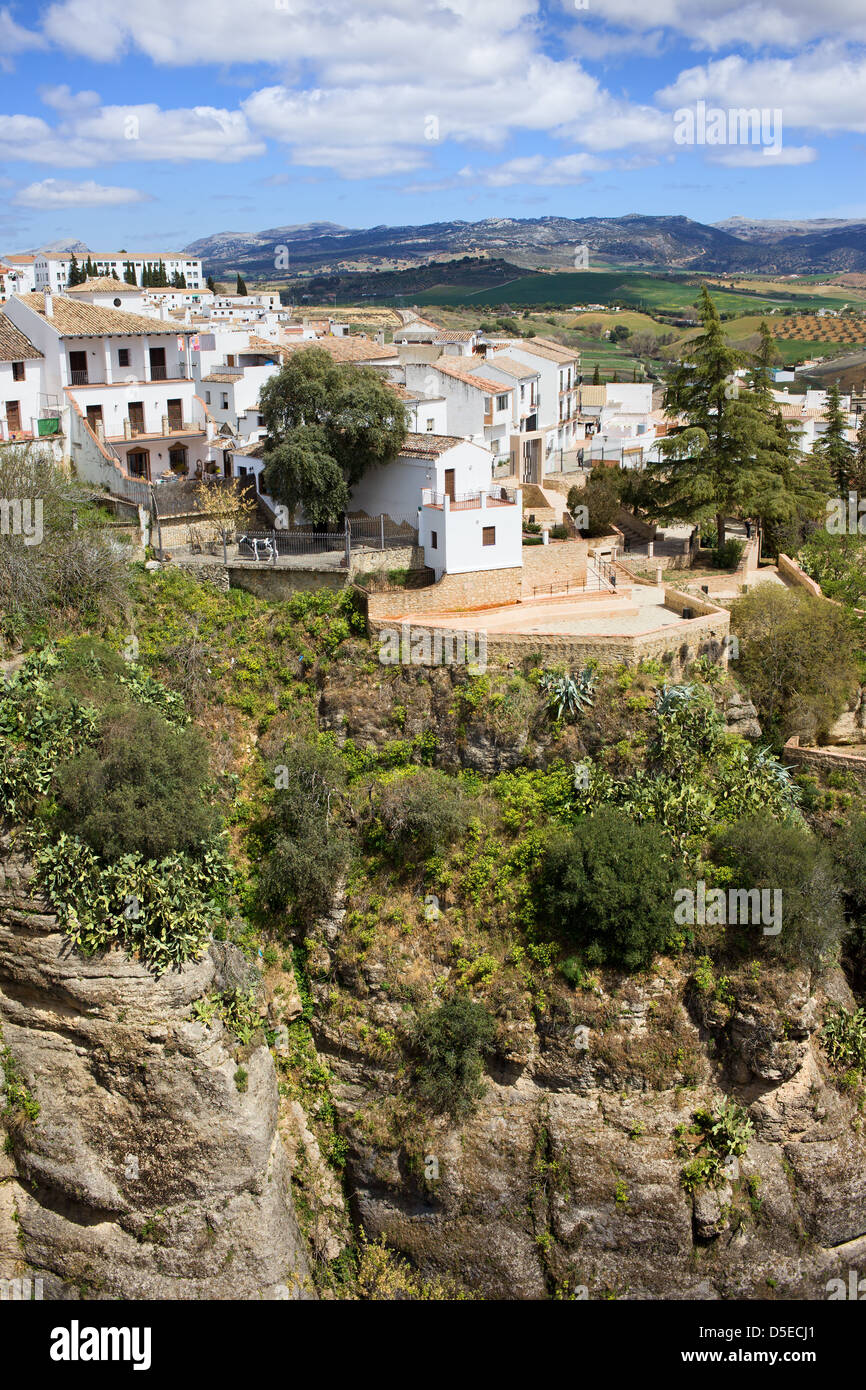 White houses on a high rock in Ronda city, southern Spain, Andalusia ...