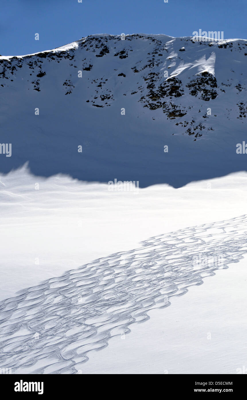 Ski tracks in the Austrian Alps Stock Photo - Alamy