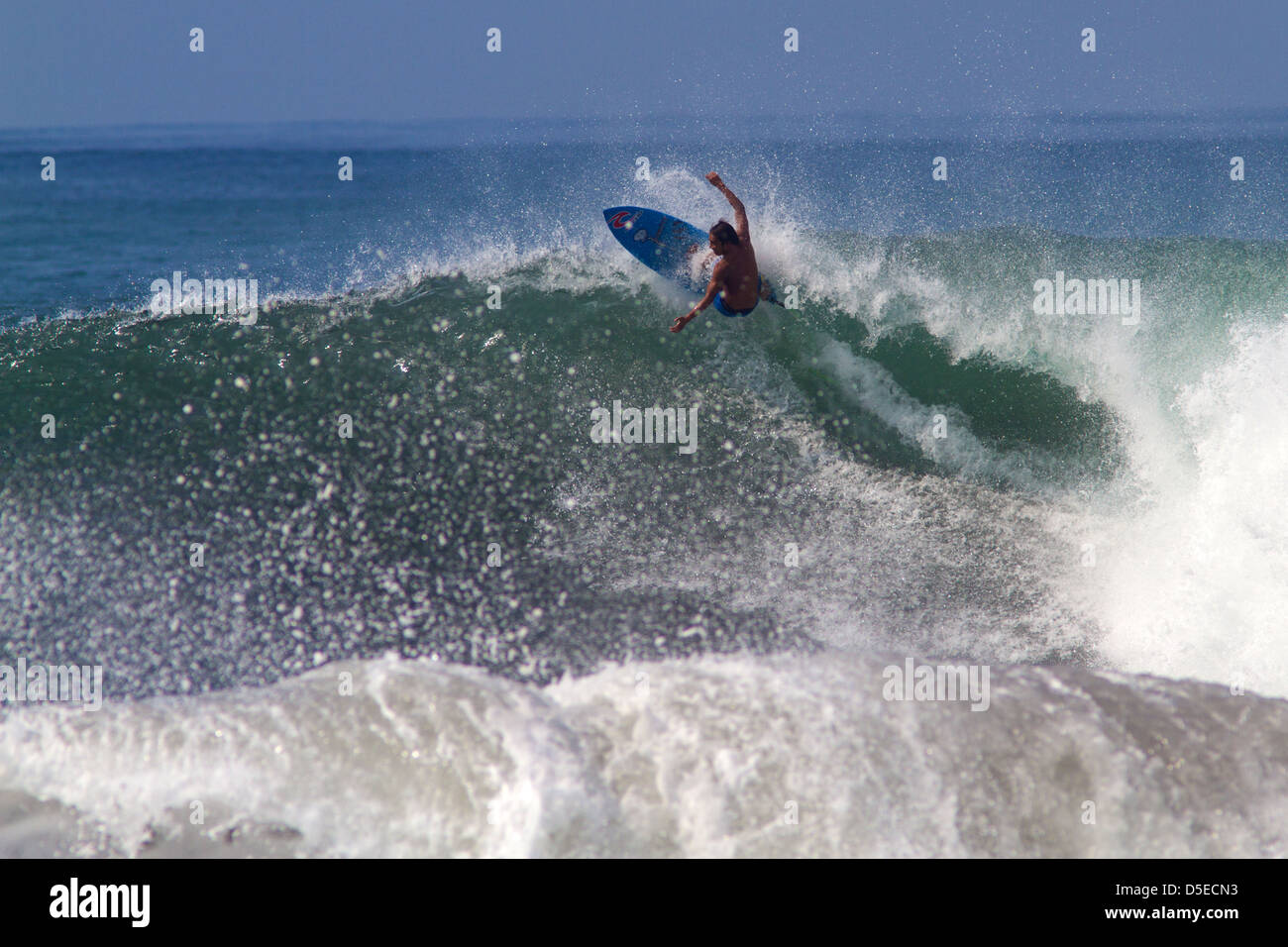 surfer ride a big wave Stock Photo - Alamy