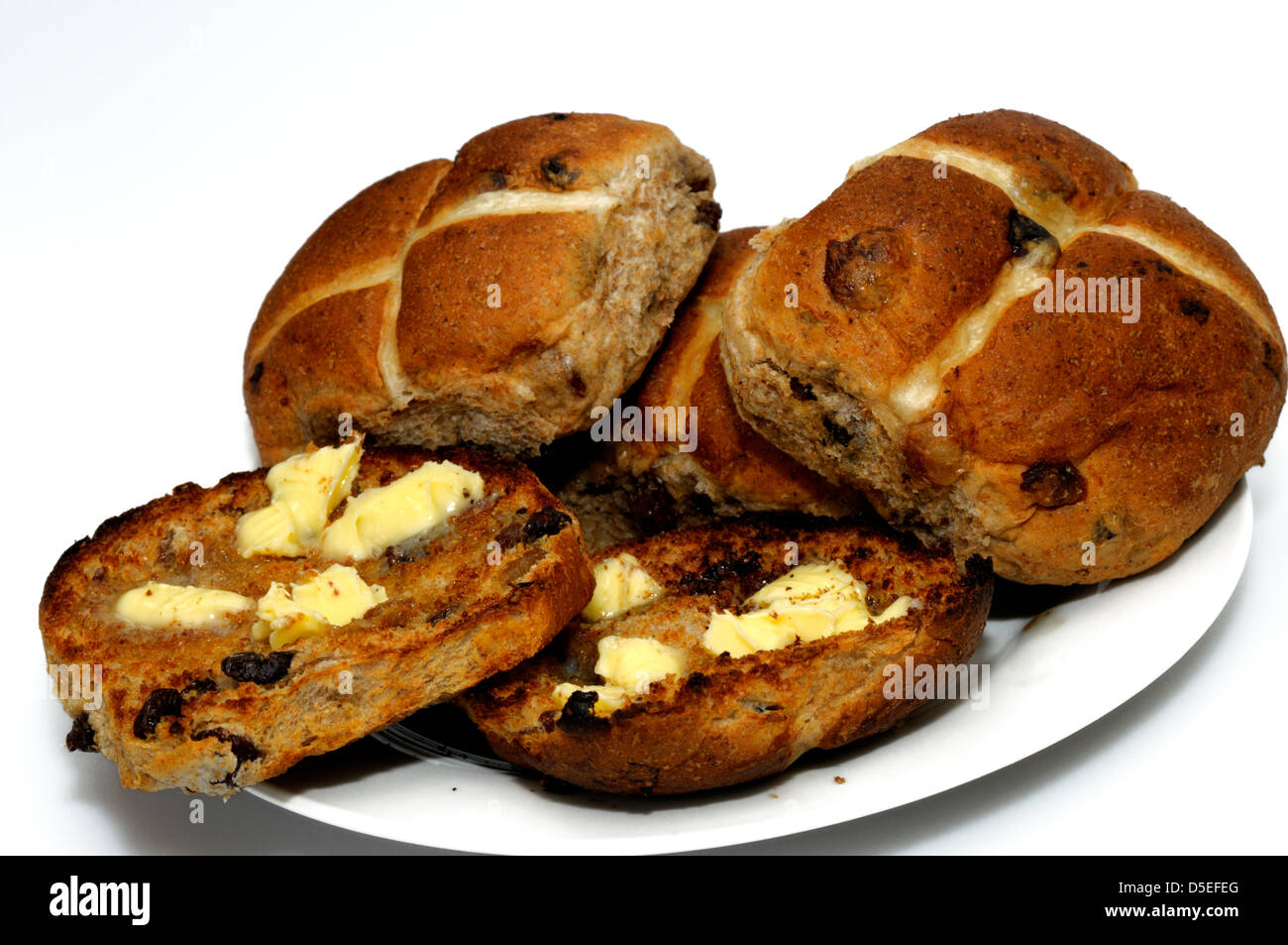 Toasted Organic Wholemeal Hot Cross Buns with Butter Stock Photo - Alamy