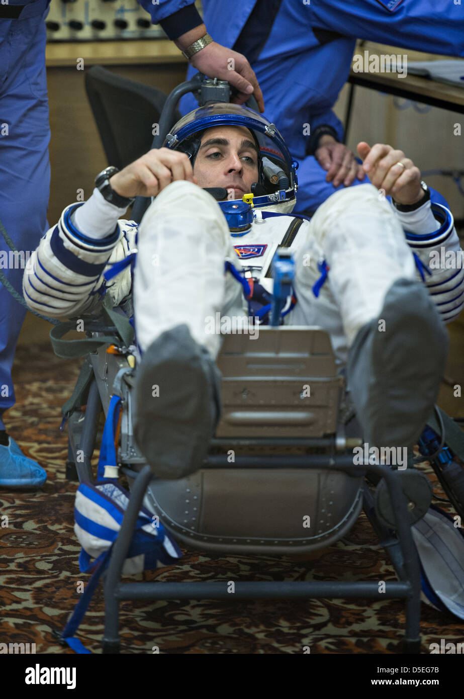 Expedition 35 NASA Flight Engineer Chris Cassidy has his Russian Sokol ...