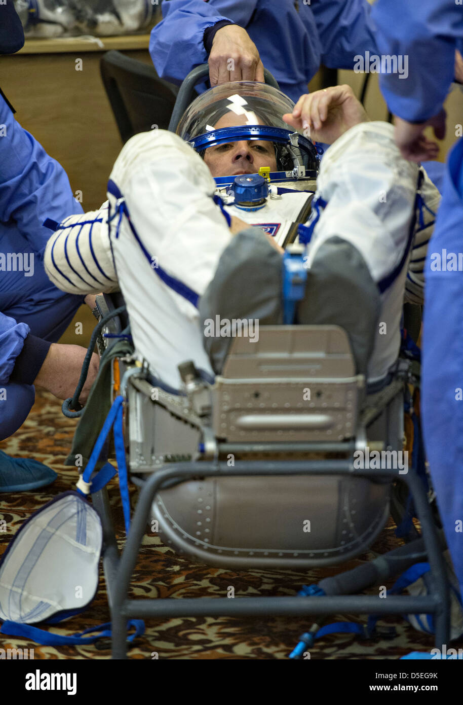 Expedition 35 NASA Flight Engineer Chris Cassidy has his Russian Sokol ...