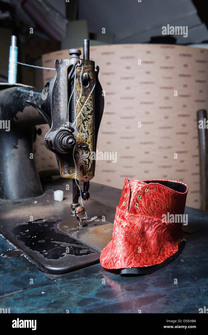 Artisan making shoes for "bound feet", Melaka, Malaysia, Asia Stock ...