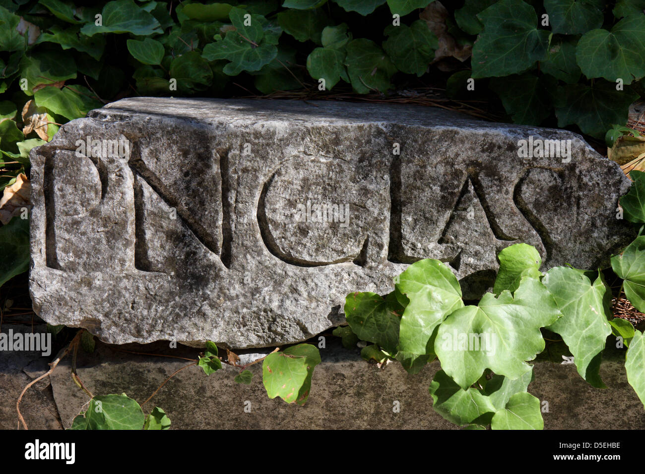 Ancient stone with roman inscription Stock Photo - Alamy
