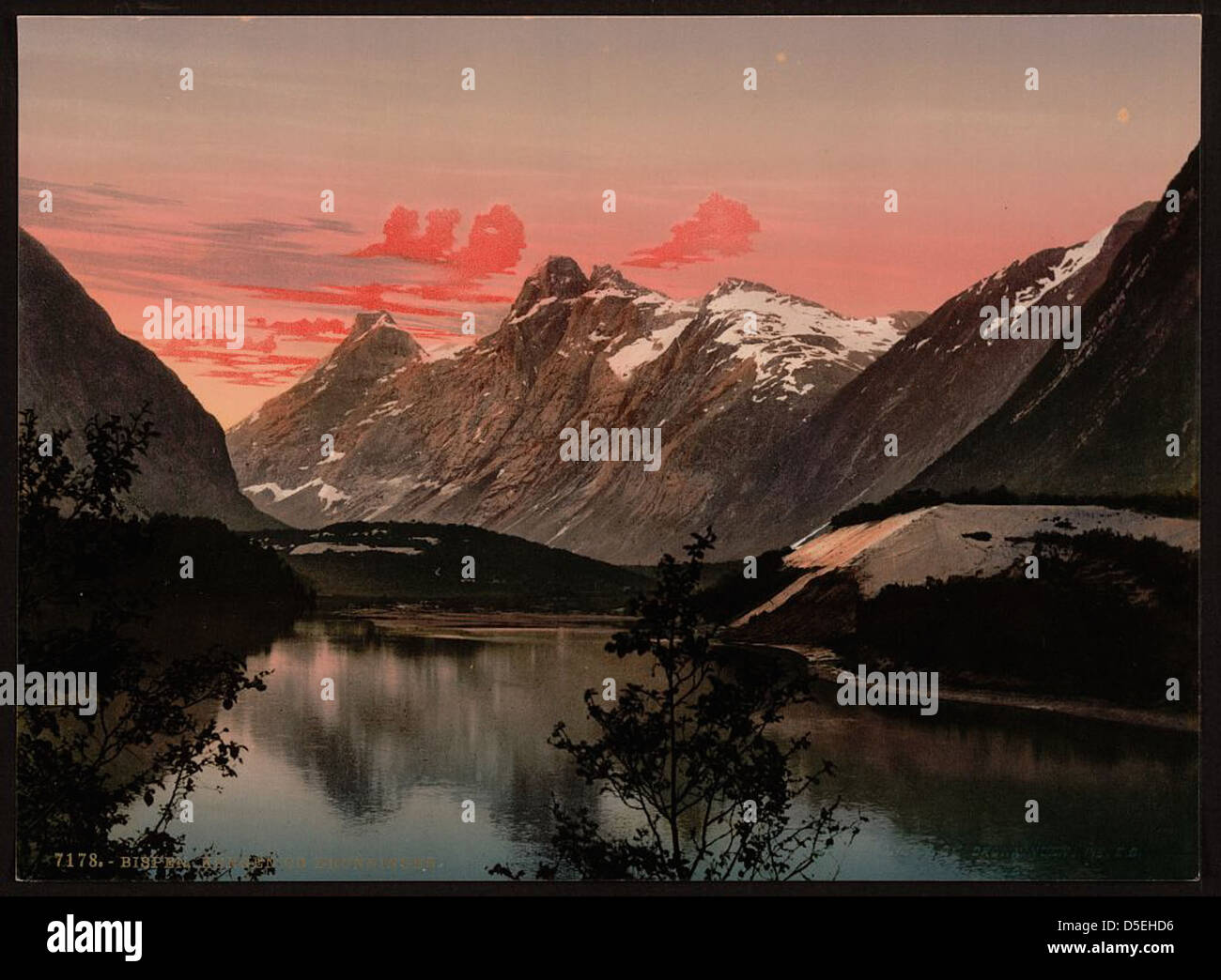 A colorized photograph of the Kongen og Dronningen mountain range near ...