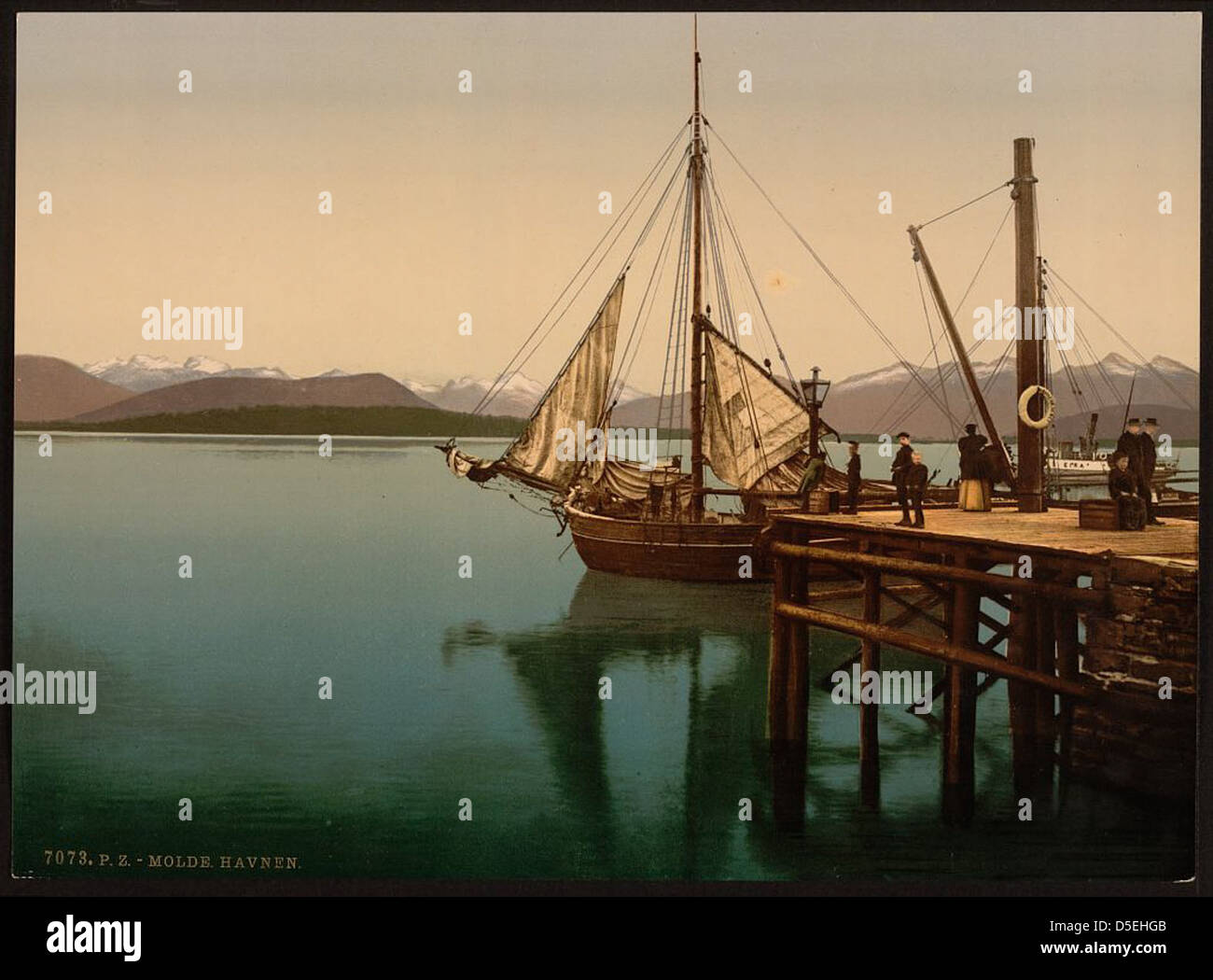 This colorized image shows a scene at the harbor (Havnen) in Molde ...