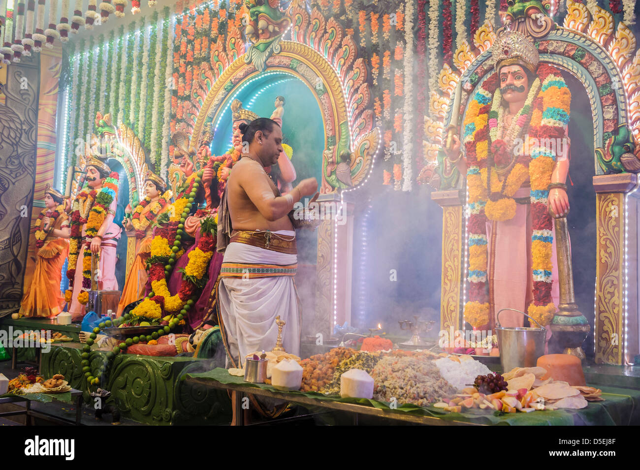 Priest performing a hinduist ceremony, Singapore, Asia Stock Photo - Alamy