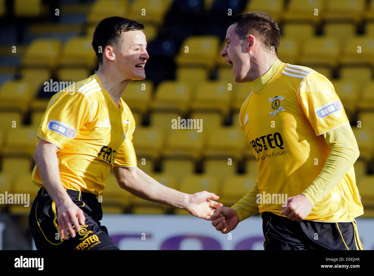 Livingston, Scotland, UK. Saturday 30th March 2013. Marc McNulty (right ...