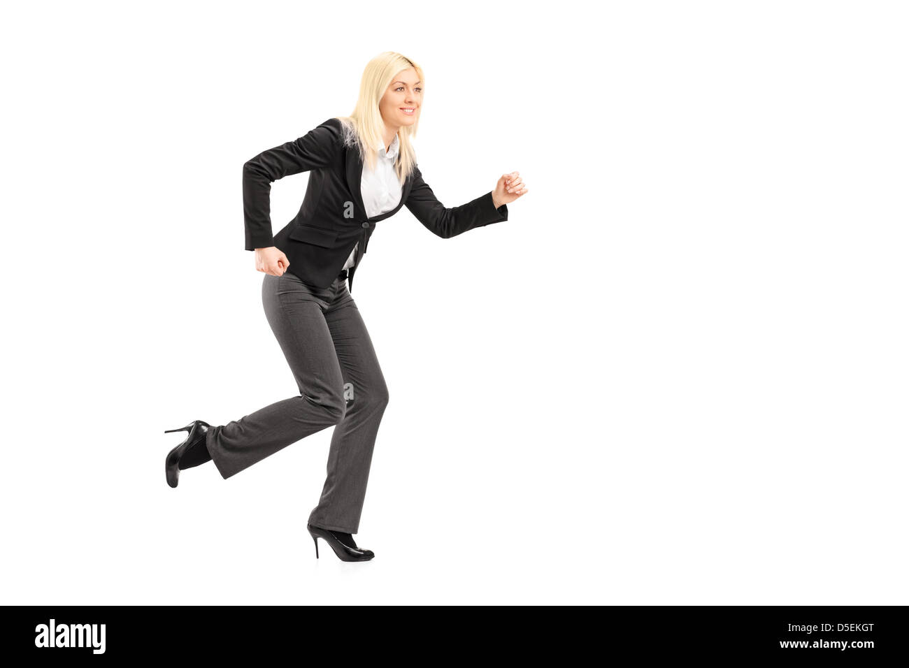 Full length portrait of a businesswoman running isolated on white ...