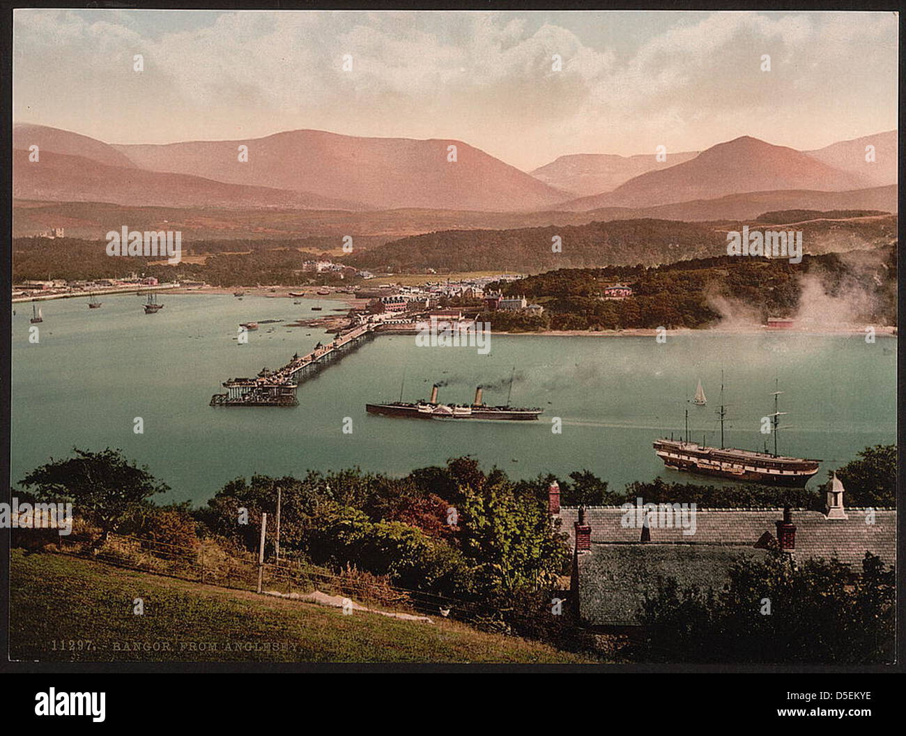 A photograph of Bangor, taken from Anglesey, Wales, showing the scenic ...