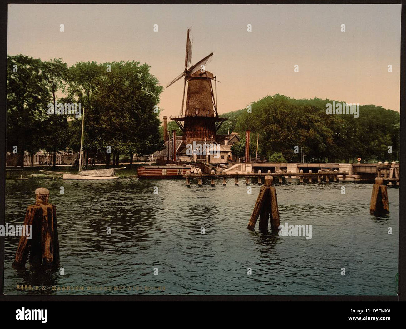 The Spaarne River in Haarlem, Netherlands, with a windmill in the ...