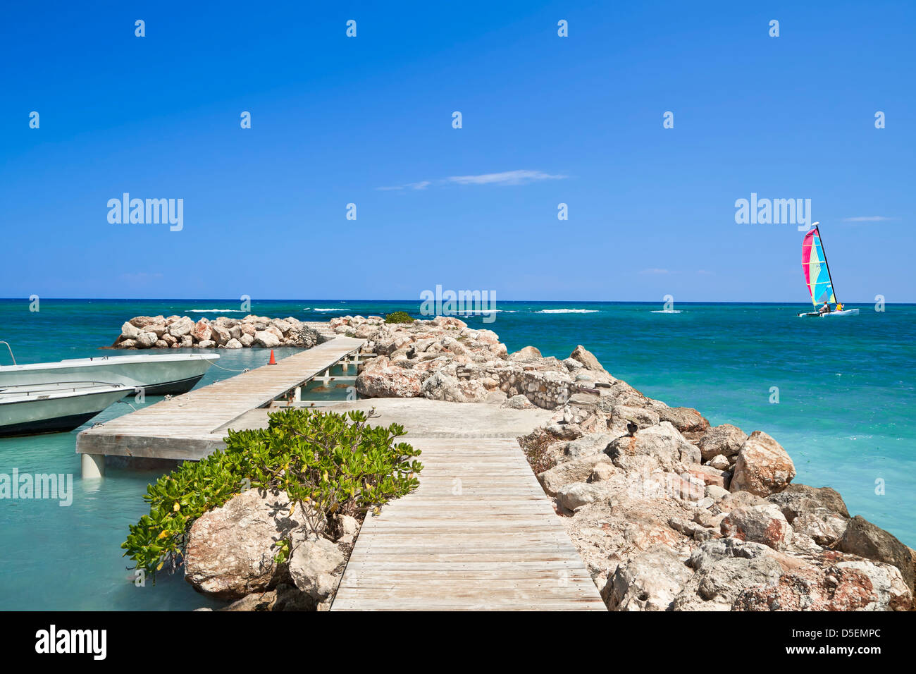 Pier and Boat Stock Photo - Alamy