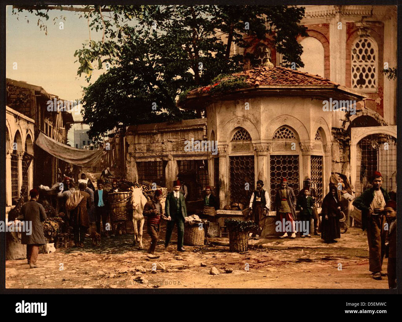 This 19th-century photograph depicts a street scene in Stamboul (now ...