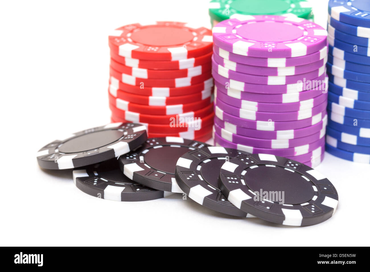 Stacks of Poker Chips, closeup on white background Stock Photo - Alamy