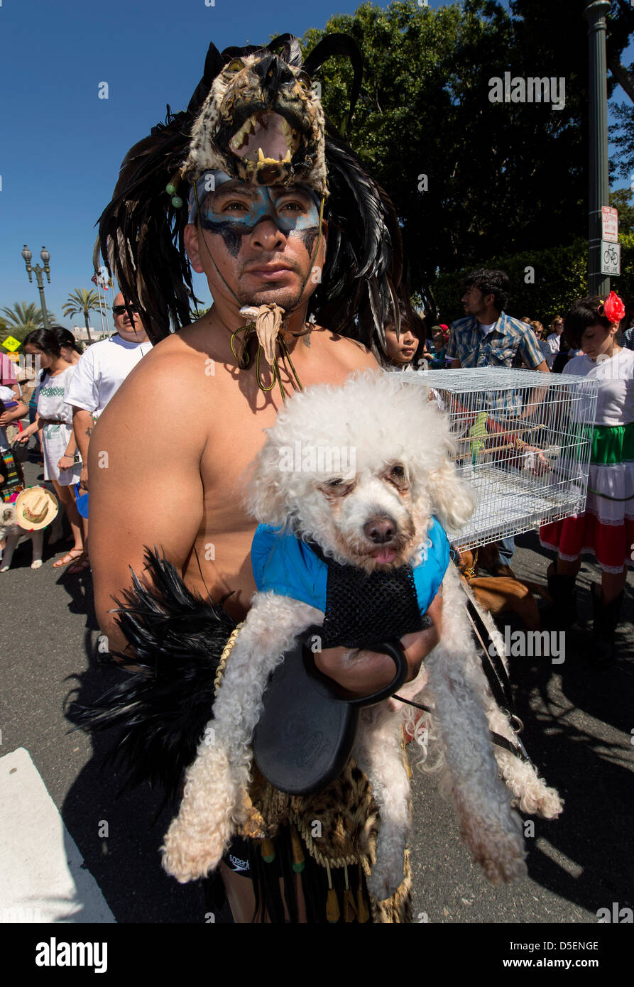 Los Angeles, California, USA. 30th March, 2013. An Aztec dancer queues ...