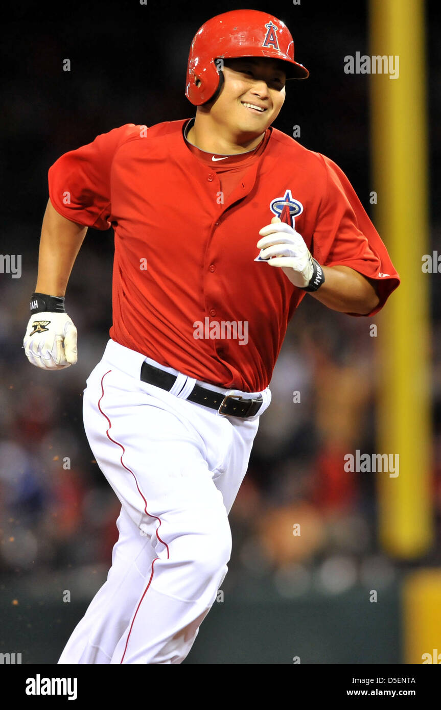 Anaheim, California, USA. 30th March, 2013. Angels' Hank Conger hits a ...