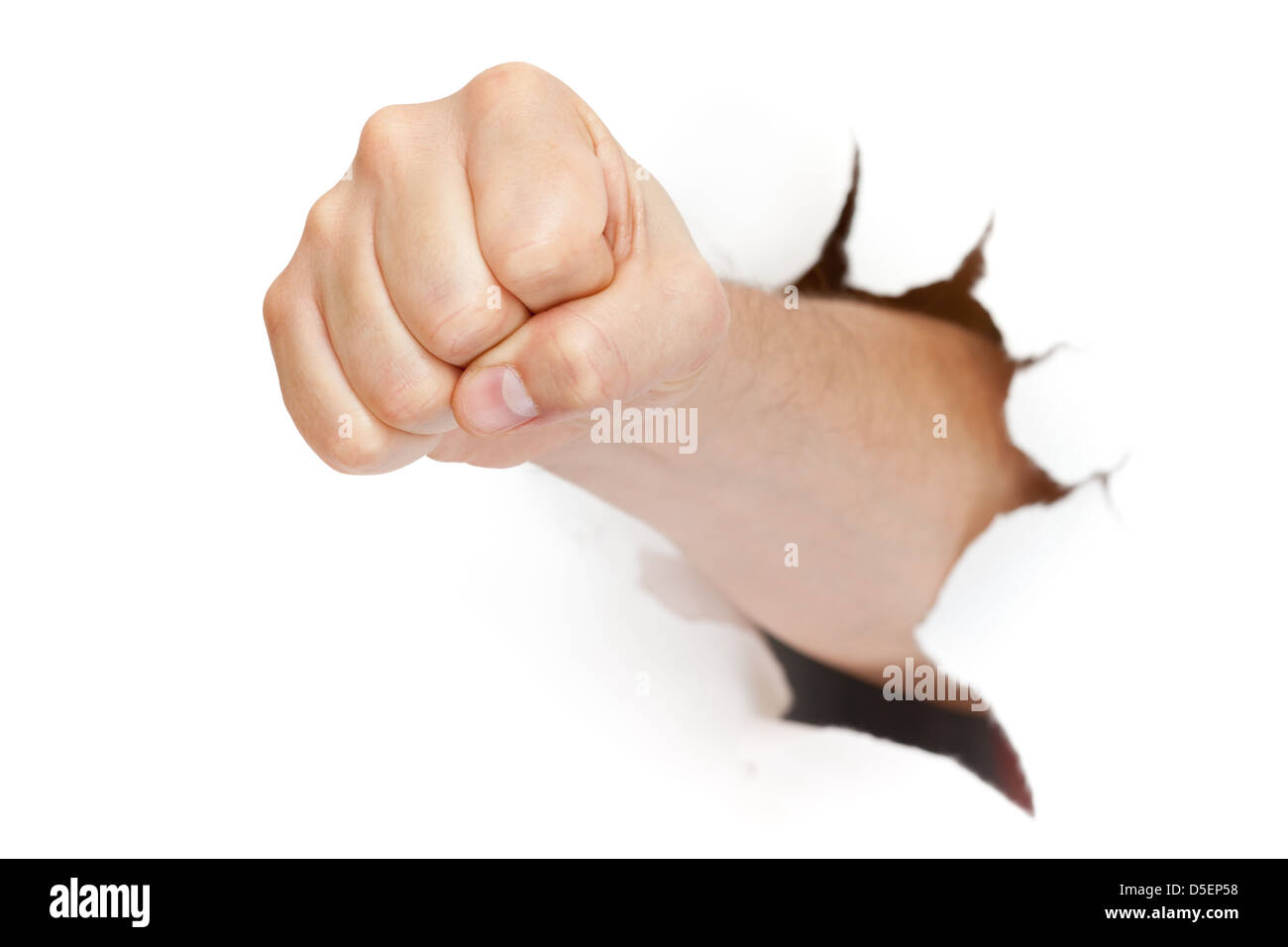 fist punching through paper isolated on white background Stock Photo ...