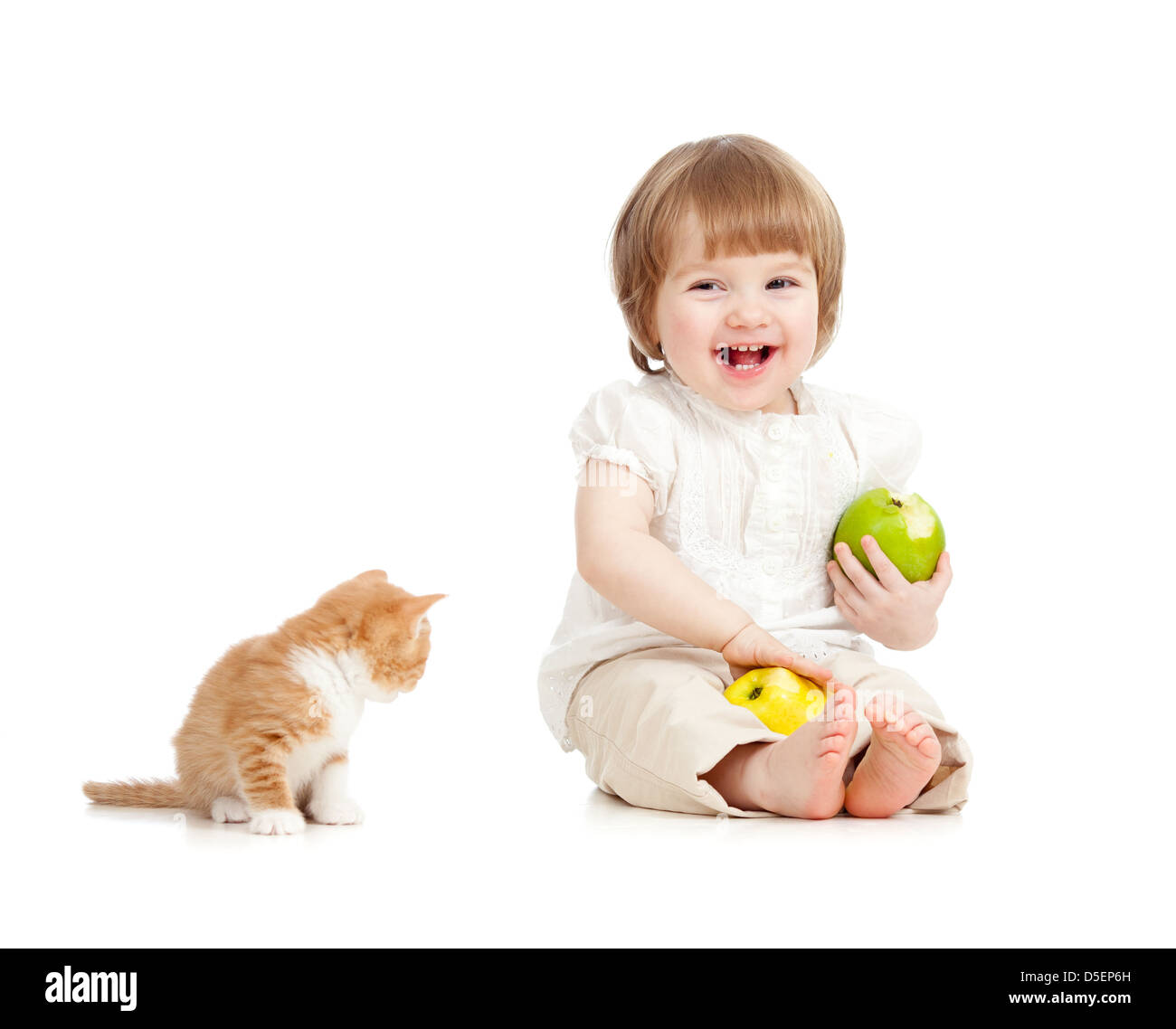 kid eating apples with cat Stock Photo - Alamy