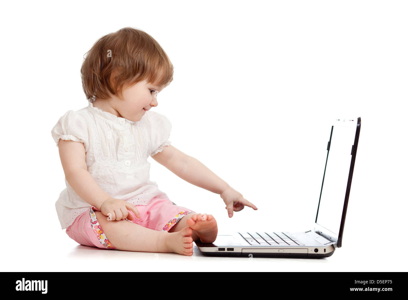 kid pointing by finger to notebook screen on white background Stock ...