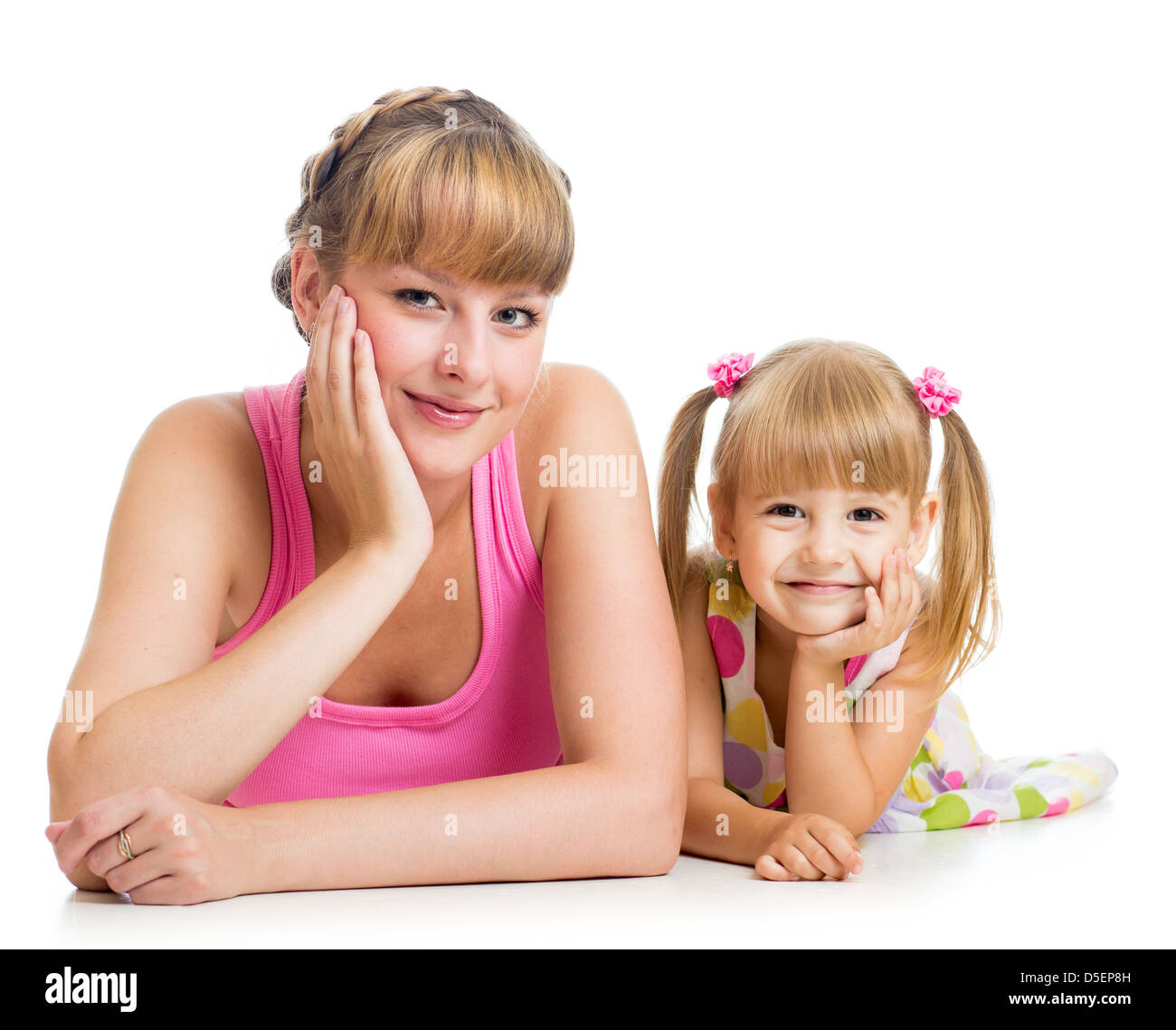 Happy mother and daughter lying on the floor Stock Photo - Alamy