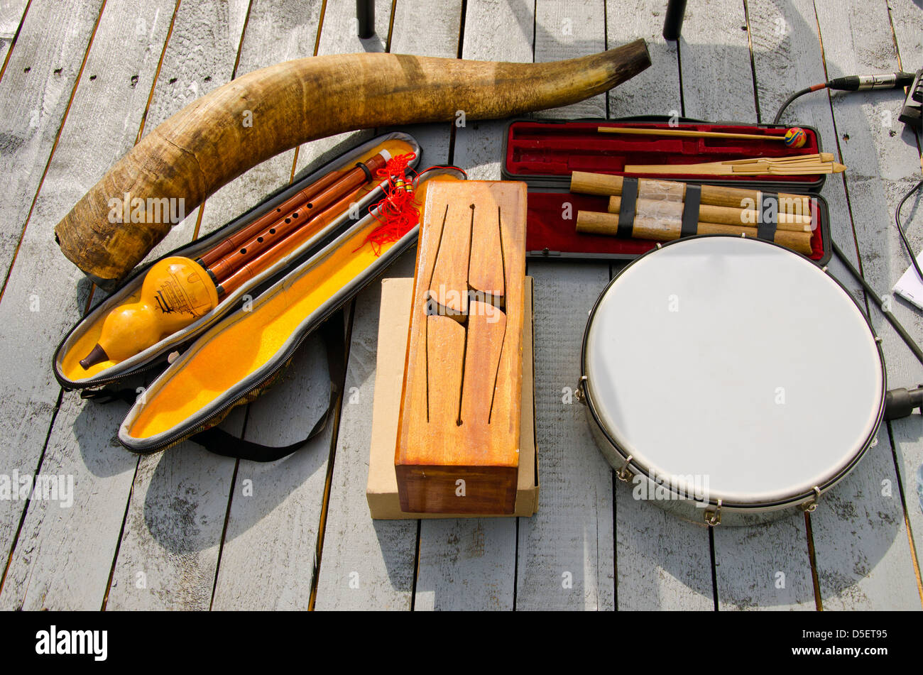 various original musical instruments on wooden stage Stock Photo - Alamy