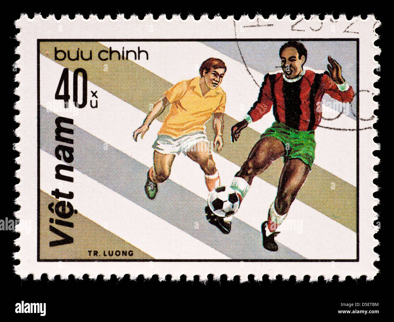 Postage stamp from Vietnam depicting two soccer players Stock Photo - Alamy